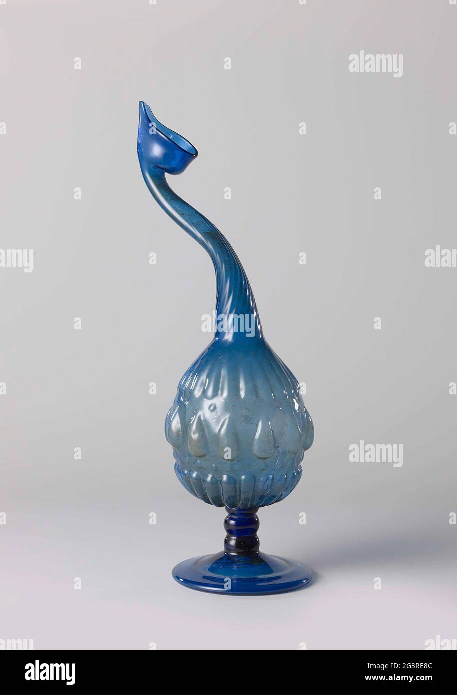 Sprinkler of blue glass. Sprinkler with flat foot with hollow, folded ...