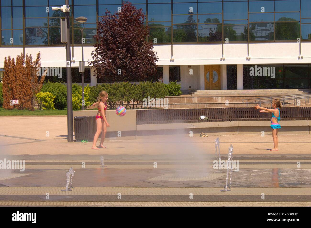 Girl playing soccer in street hi-res stock photography and images - Alamy