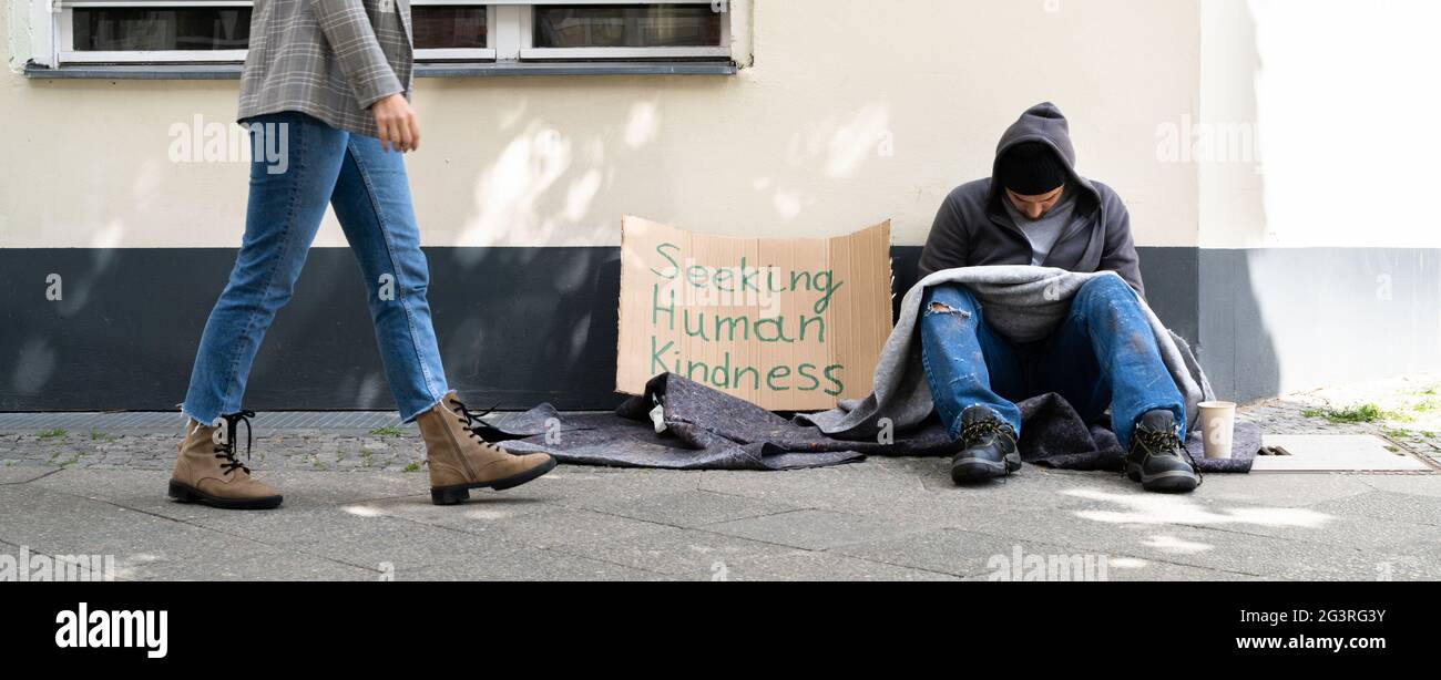 Begging Poor Man. Problems, Despair And Homelessness Stock Photo - Alamy