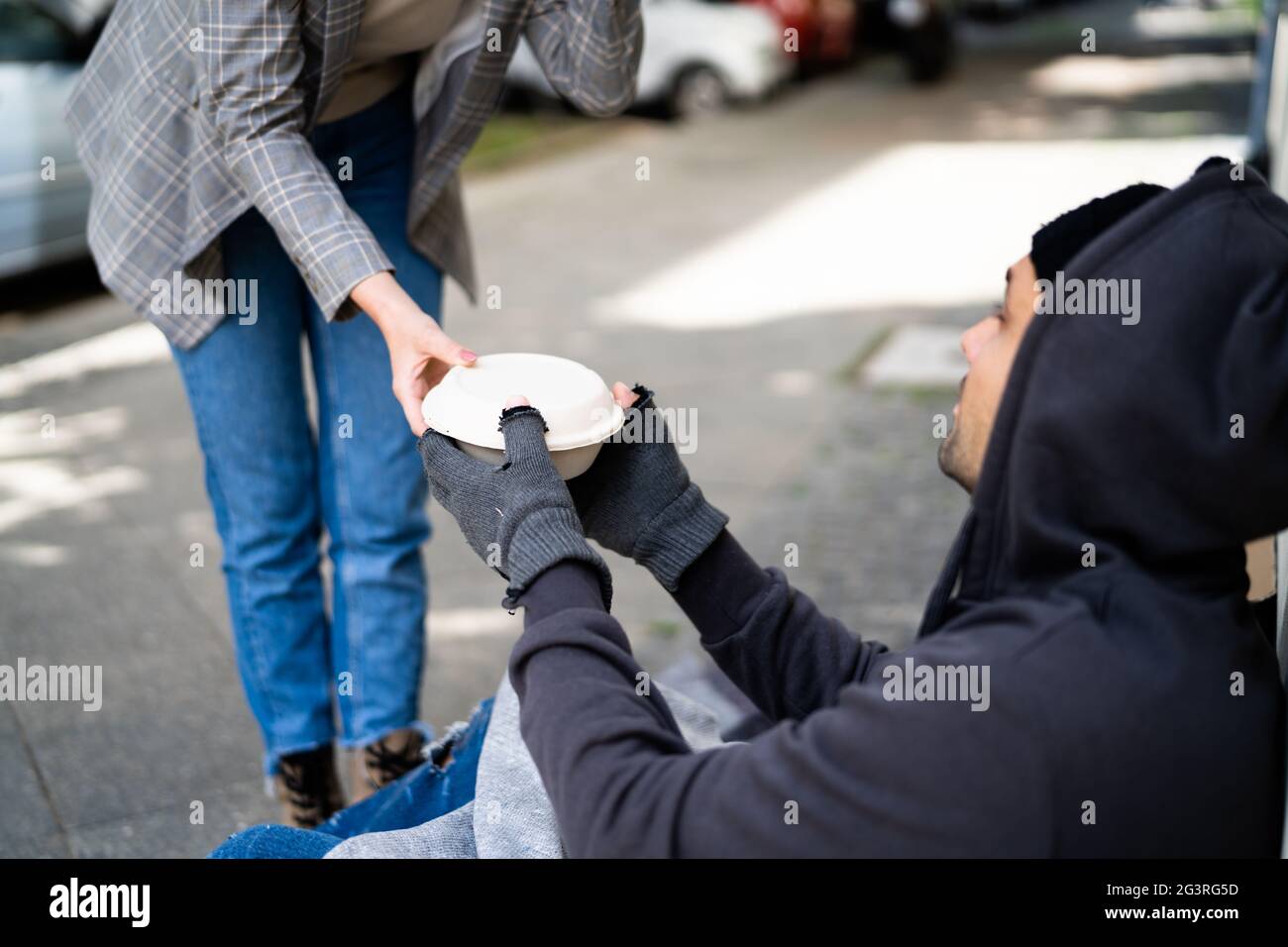 Homeless Food Help. Human Poverty. Poor Man Stock Photo - Alamy
