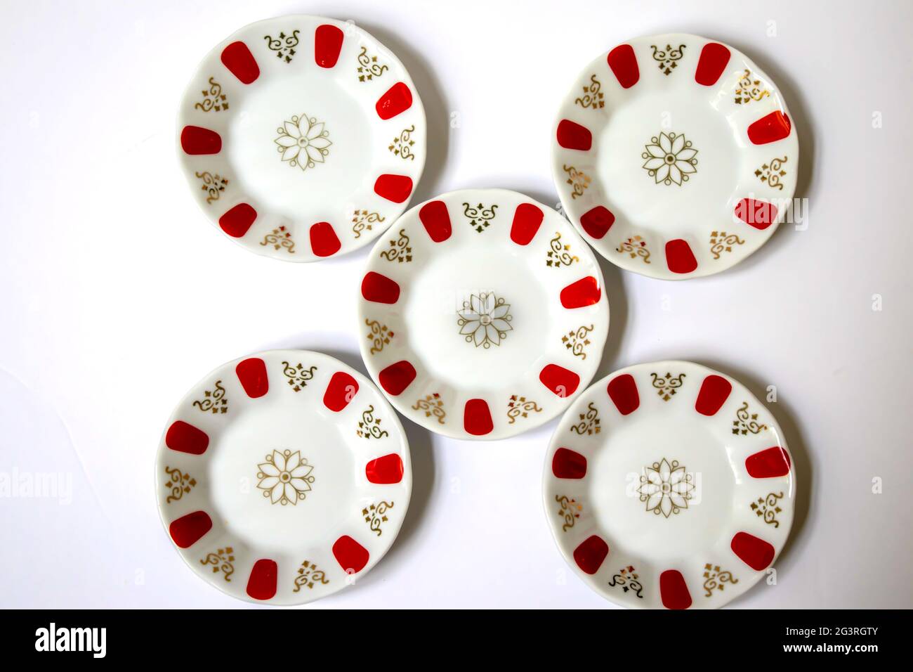 Close-up tea plate on white background. A must for tea glasses; Persian ...