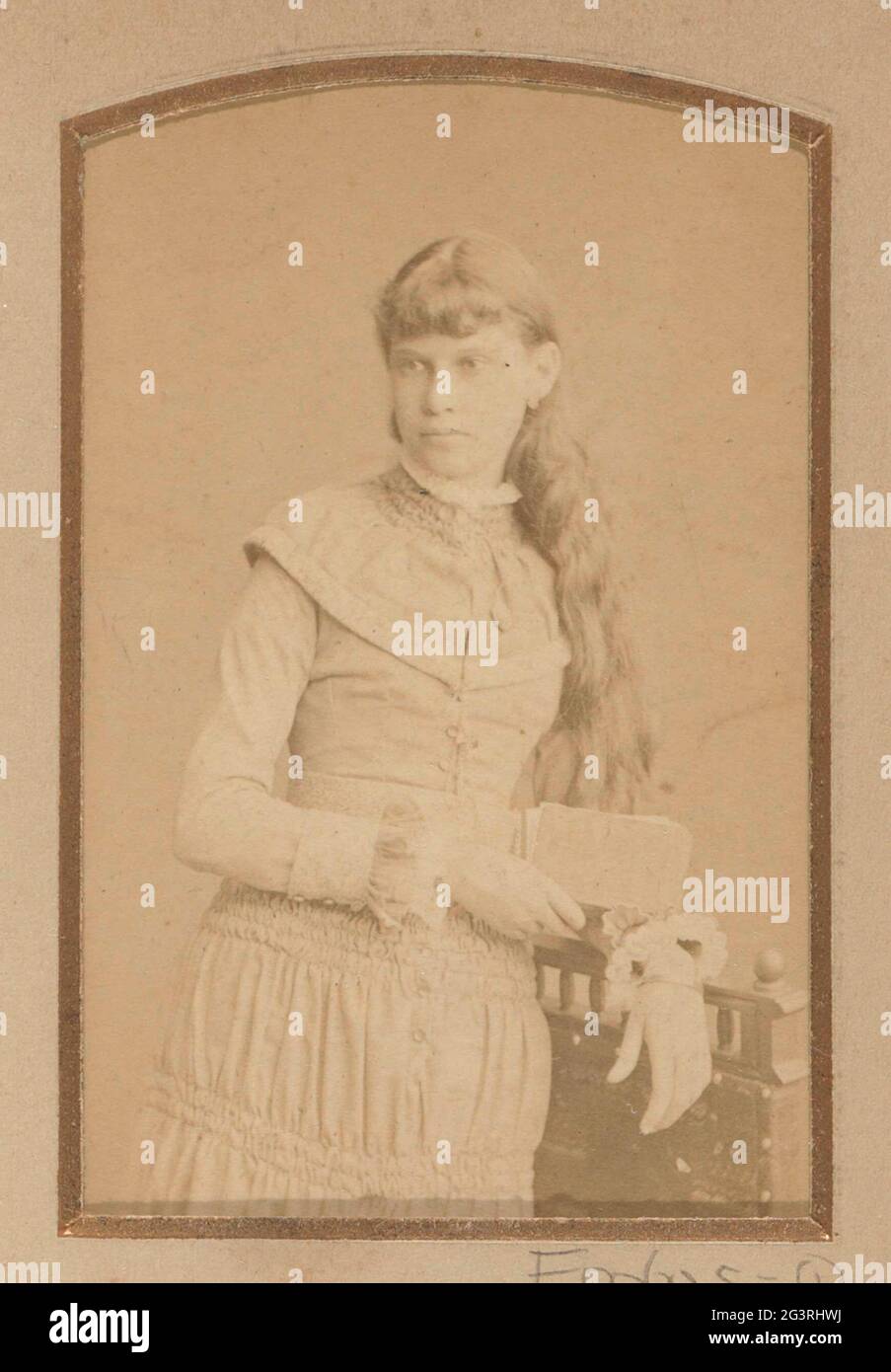 Portrait of a girl with a book. Part of album with 28 photos of a Dutch ...