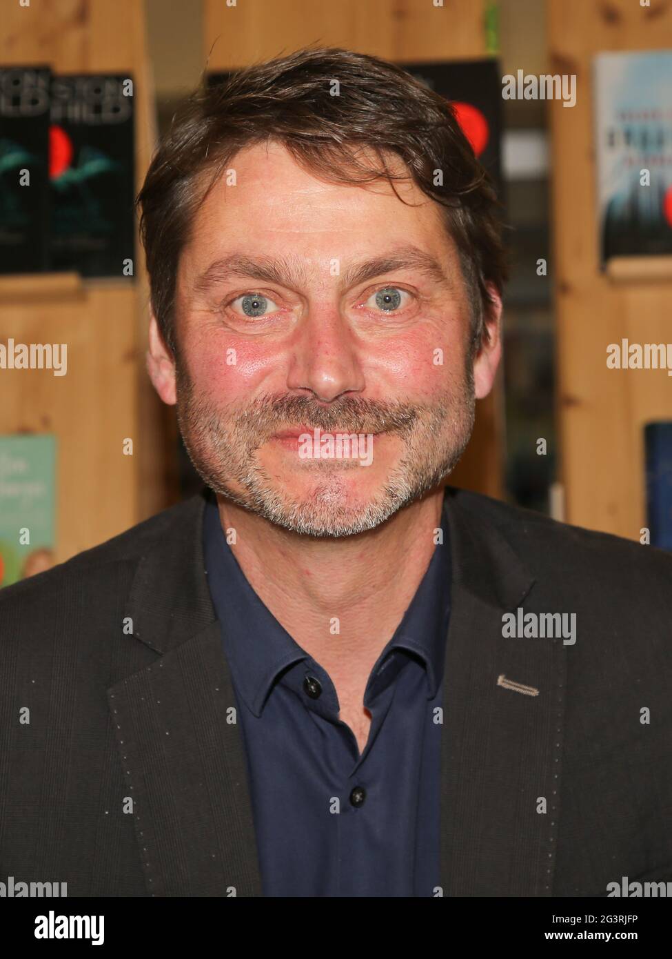 German journalist and author Andreas Speit at a book reading on ...