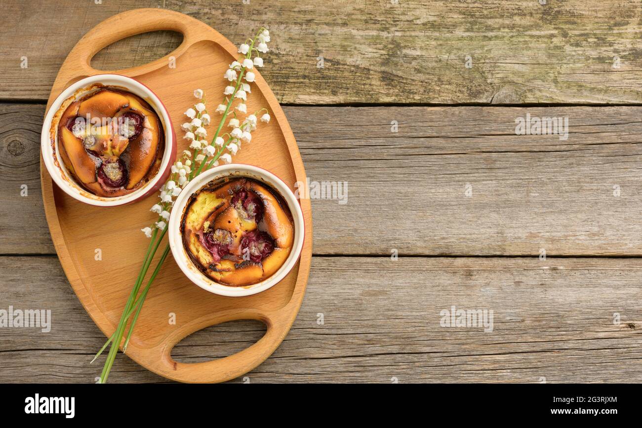 cottage cheese dessert baked in portioned round ceramic plates on a ...