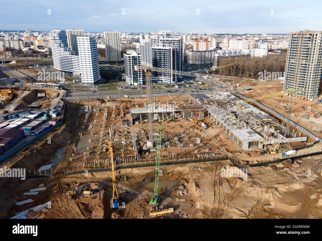 Tower cranes in action at construction site. Crane during formworks ...