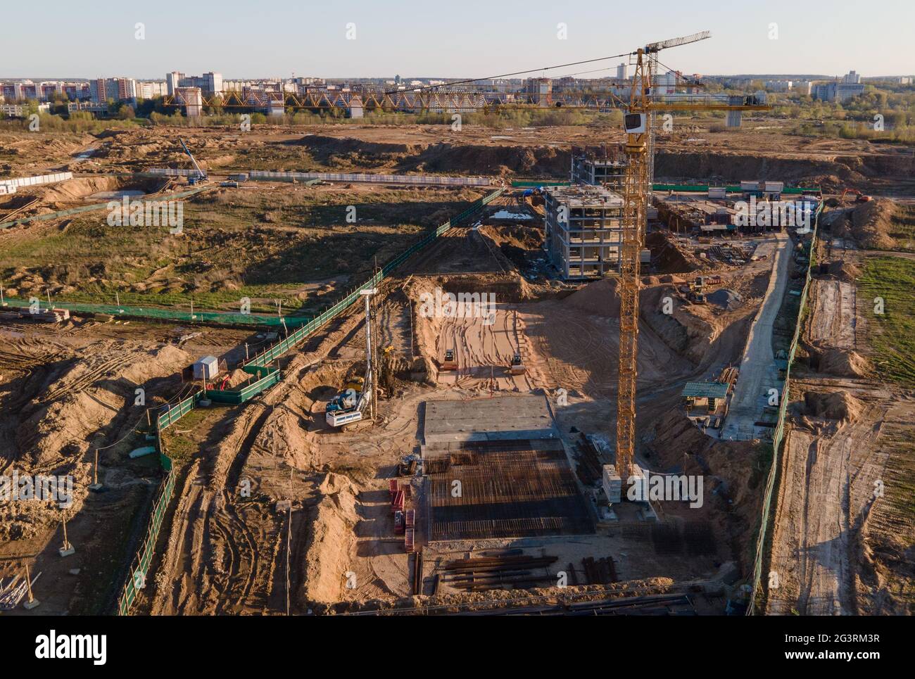 Tower cranes in action at construction site. Crane during formworks ...