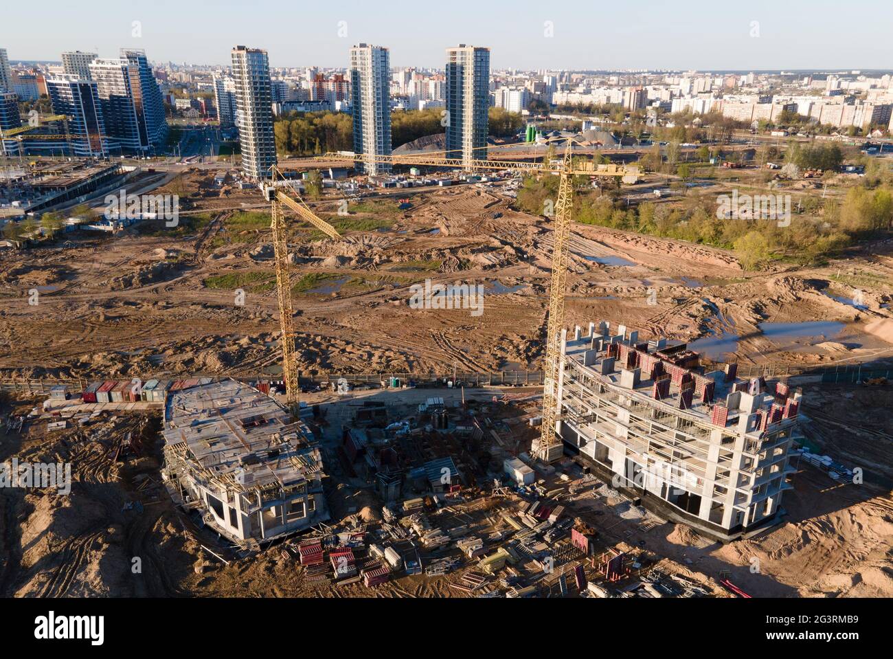 Tower cranes in action at construction site. Crane during formworks ...