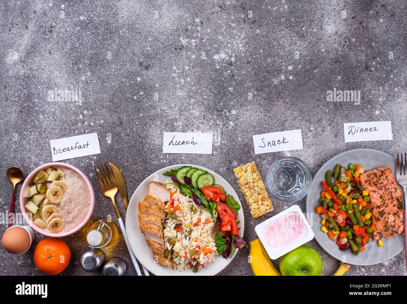 Breakfast, lunch and dinner. Balanced menu Stock Photo - Alamy