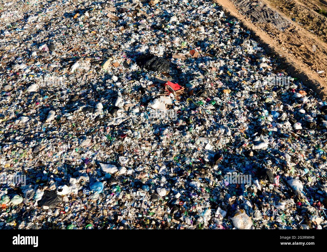 Garbage dump with plastic bags and food waste. Recycling of waste on ...