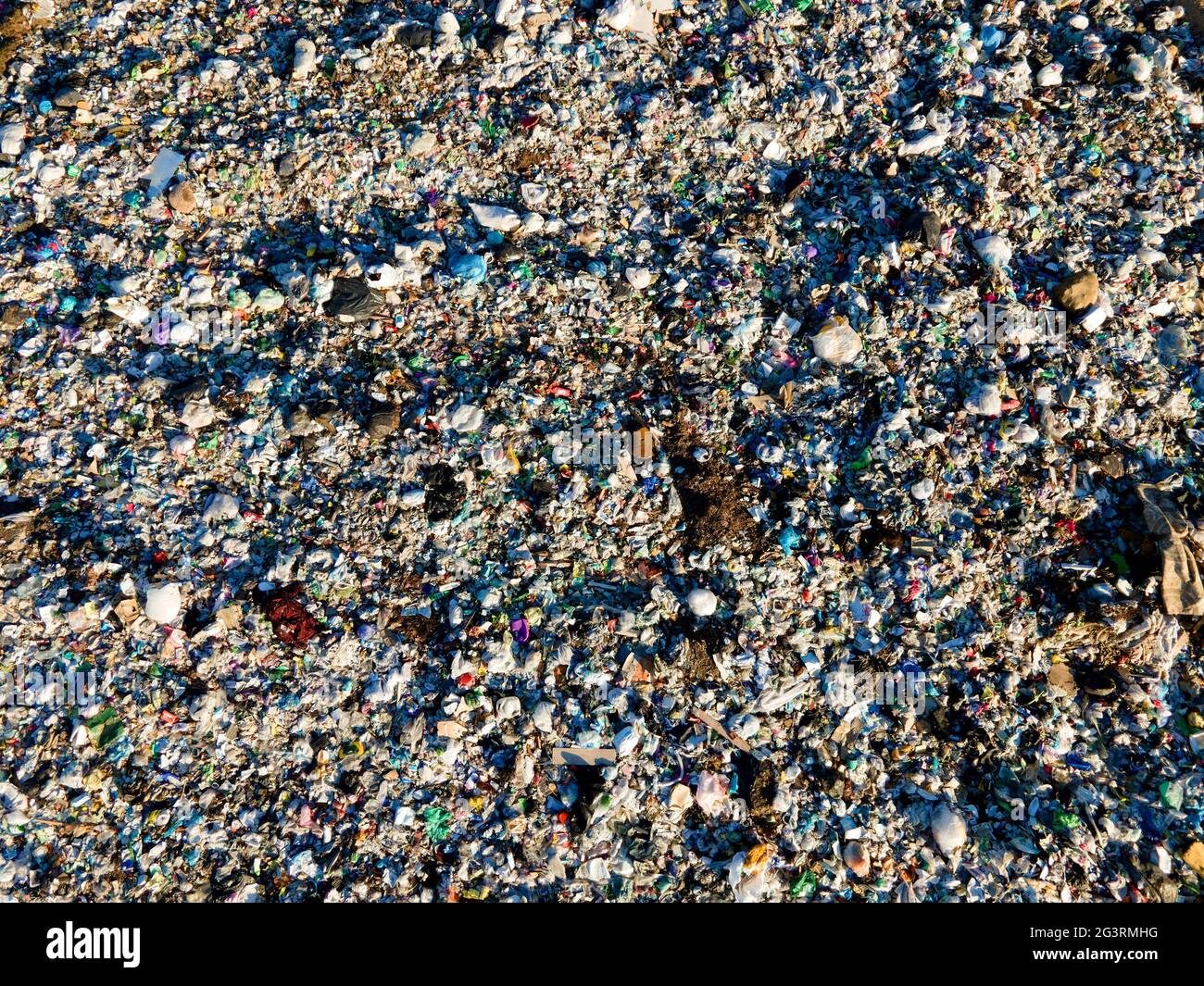 Garbage dump with plastic bags and food waste. Recycling of waste on ...