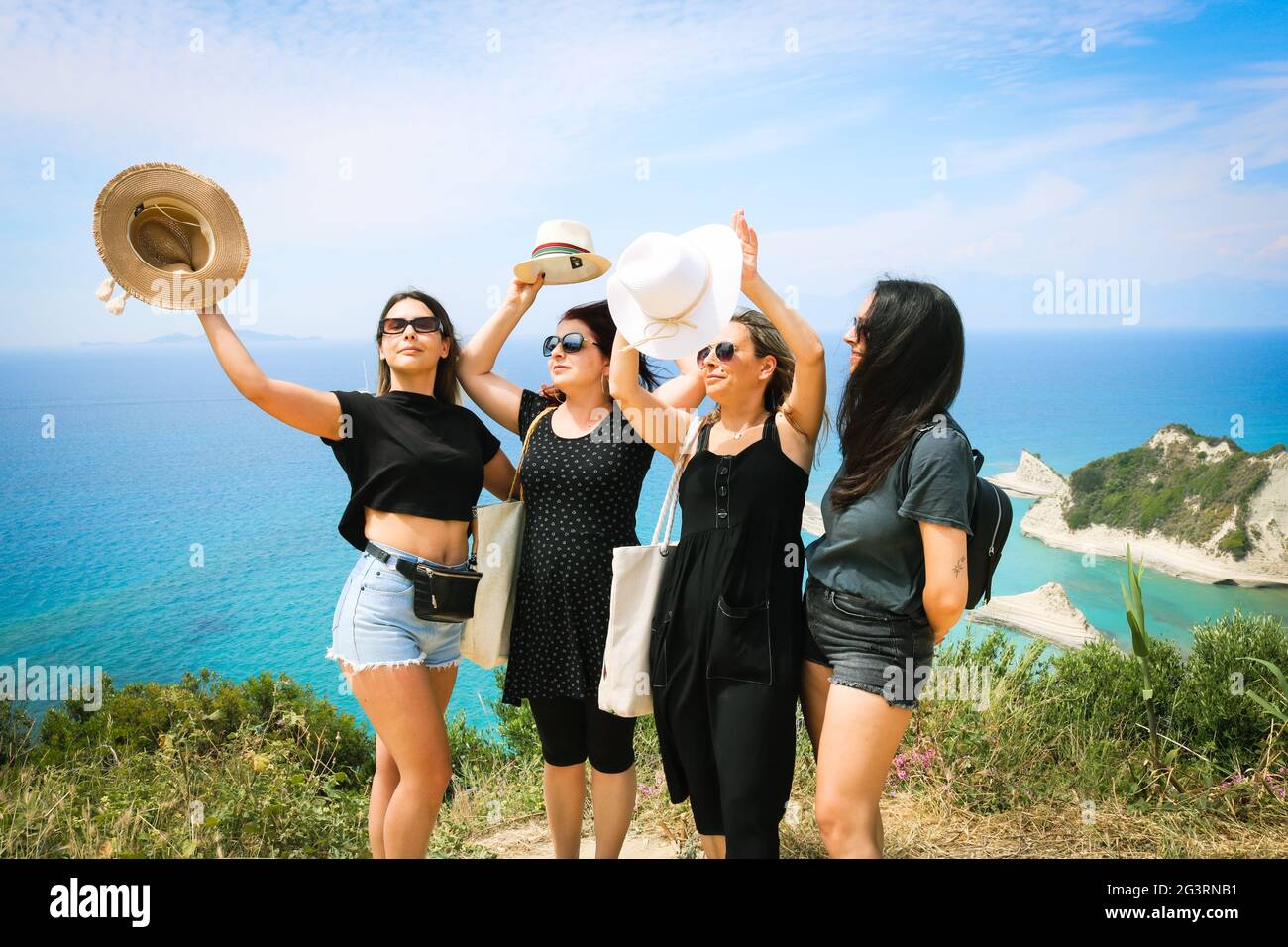 Group of friends at the seaside Stock Photo - Alamy