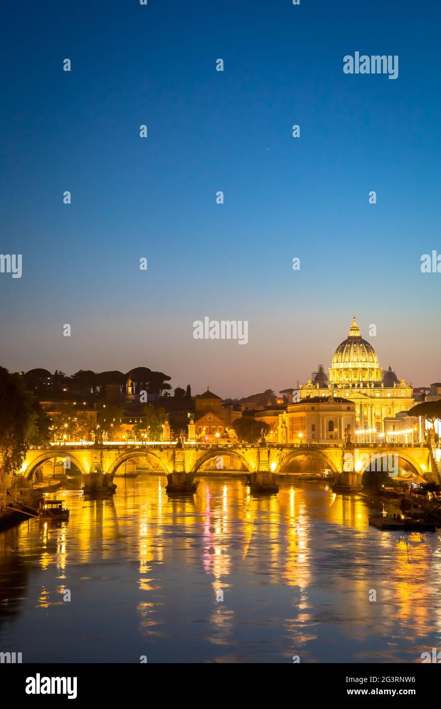 Sunset on Tiber river bridge with Vatican City - Rome, Italy Stock ...