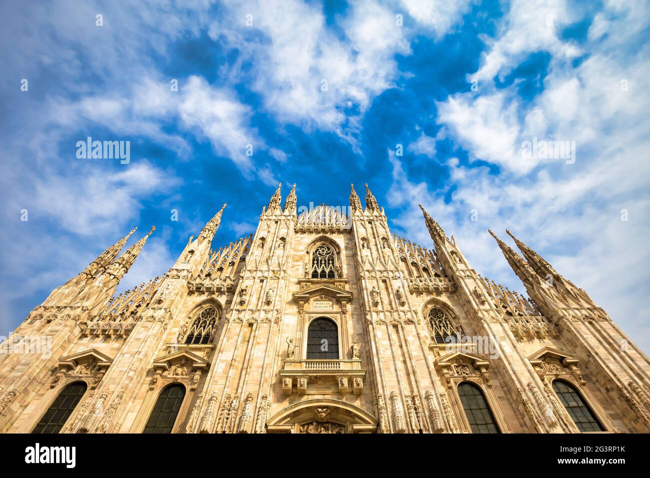 Milan Cathedral (Duomo di Milano) with blue sky and sunset light Stock ...