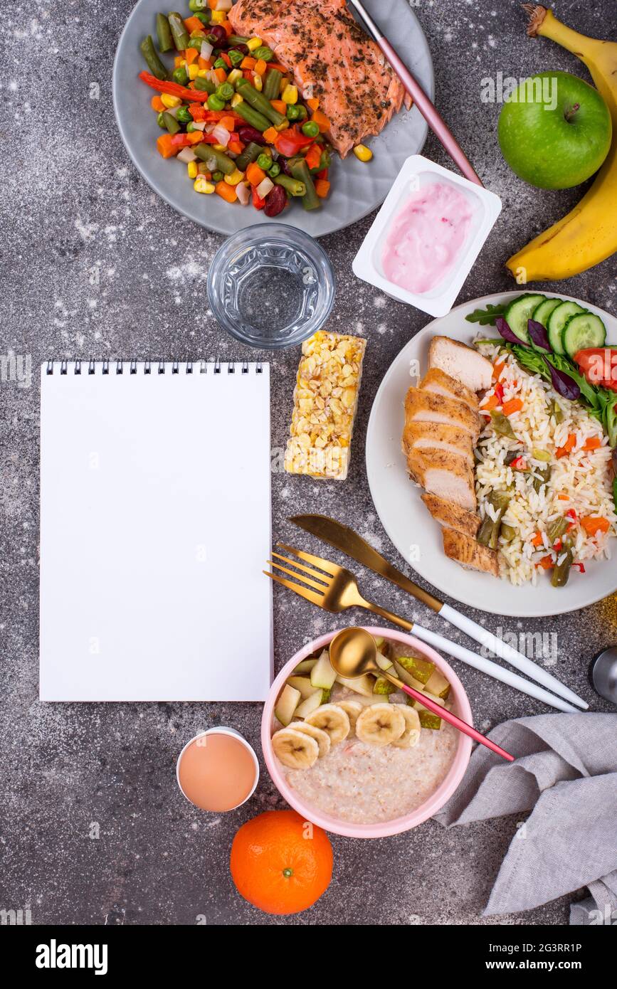 Breakfast, lunch and dinner. Balanced menu Stock Photo - Alamy