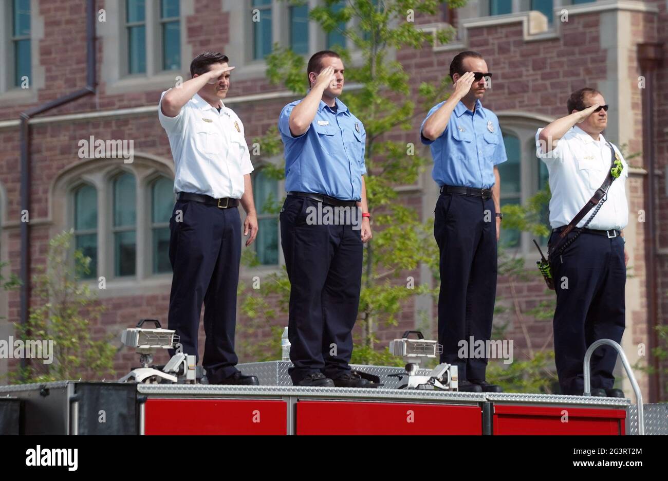 Saluting firefighters hi-res stock photography and images - Alamy