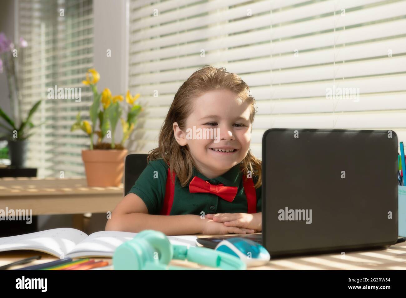 Child schoolboy pupil learn english online at home school ...