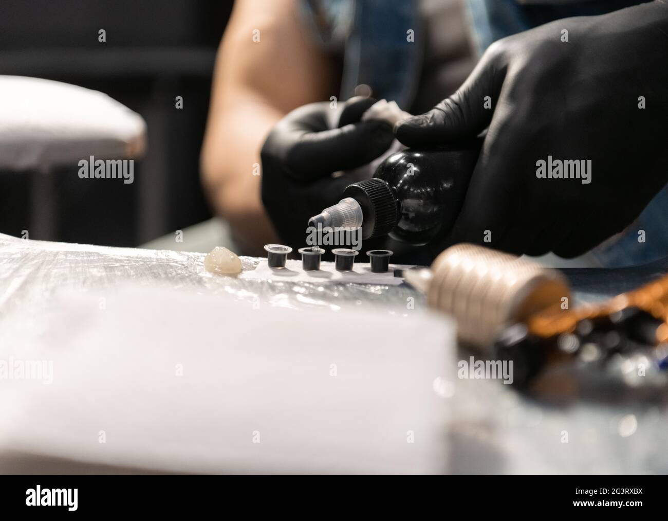 Tattooist ink hi-res stock photography and images - Alamy