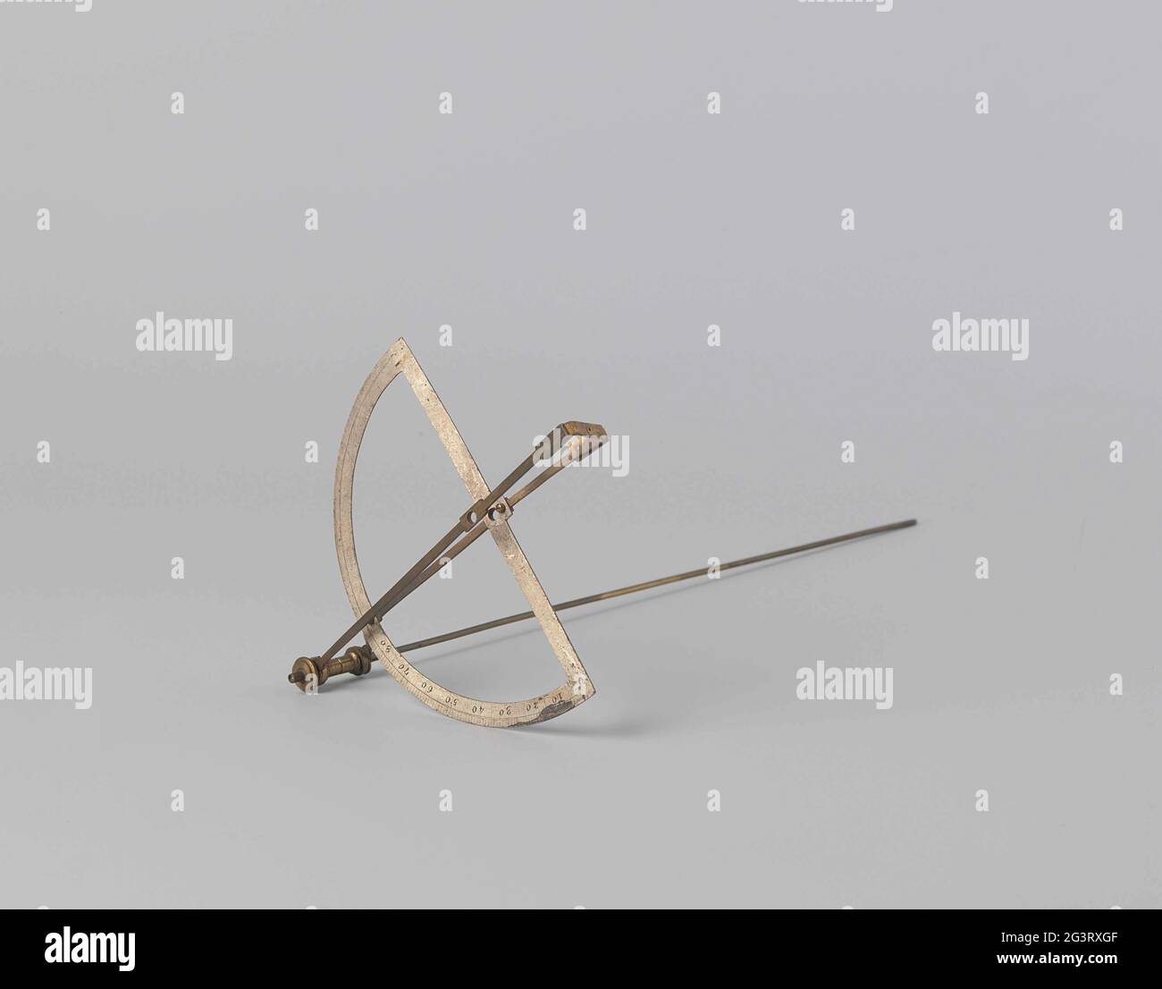 Degree arch. Brass degree arch to a long spindle. On a side edge bow ...