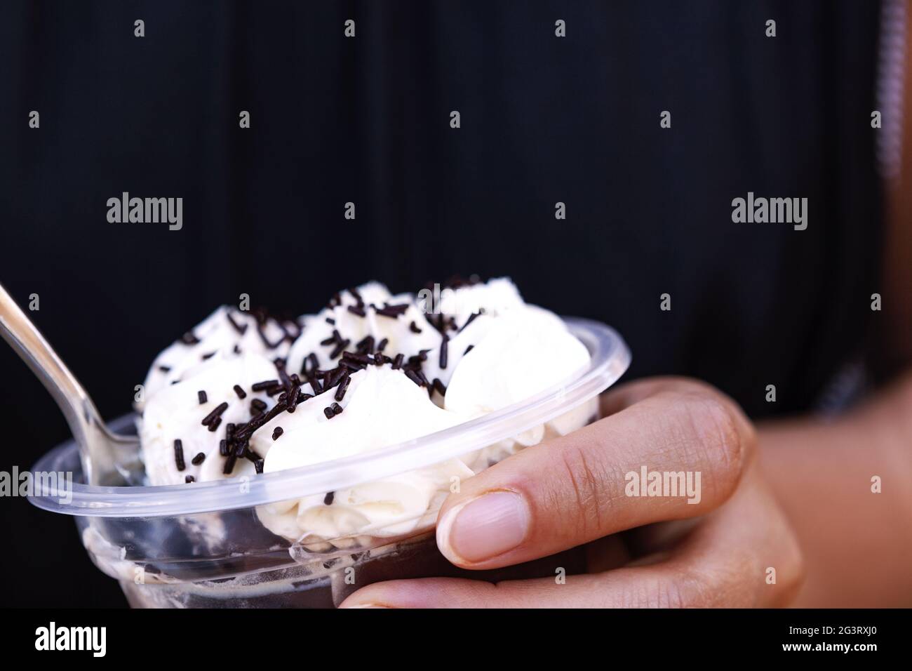 Woman eating chocolate pudding hi-res stock photography and images - Alamy