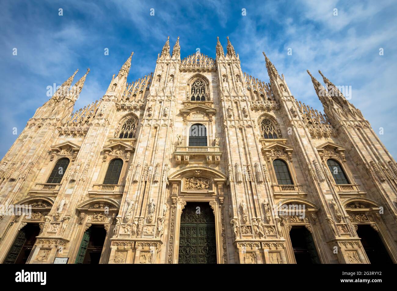 Milan Cathedral (Duomo di Milano) with blue sky and sunset light Stock ...