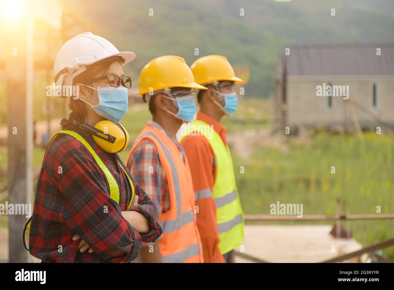 workers wear a quarantine face mask Stock Photo - Alamy