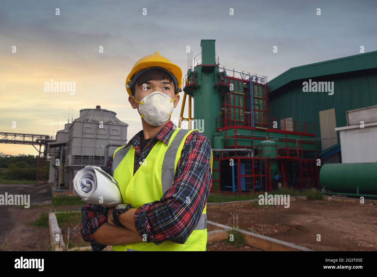 Engineers working in the power plant area Stock Photo - Alamy