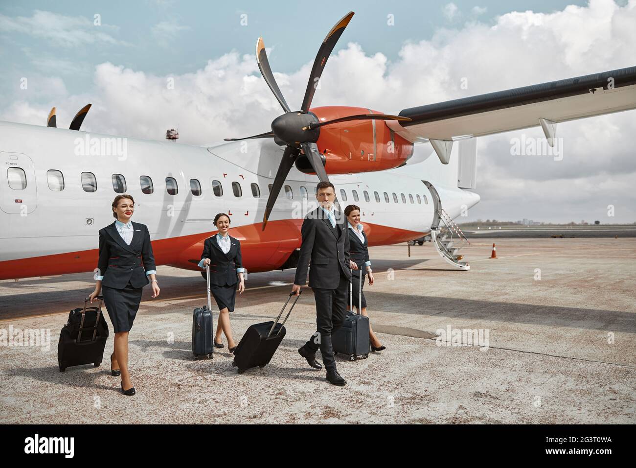 Airplane flight attendant serious hi-res stock photography and images ...