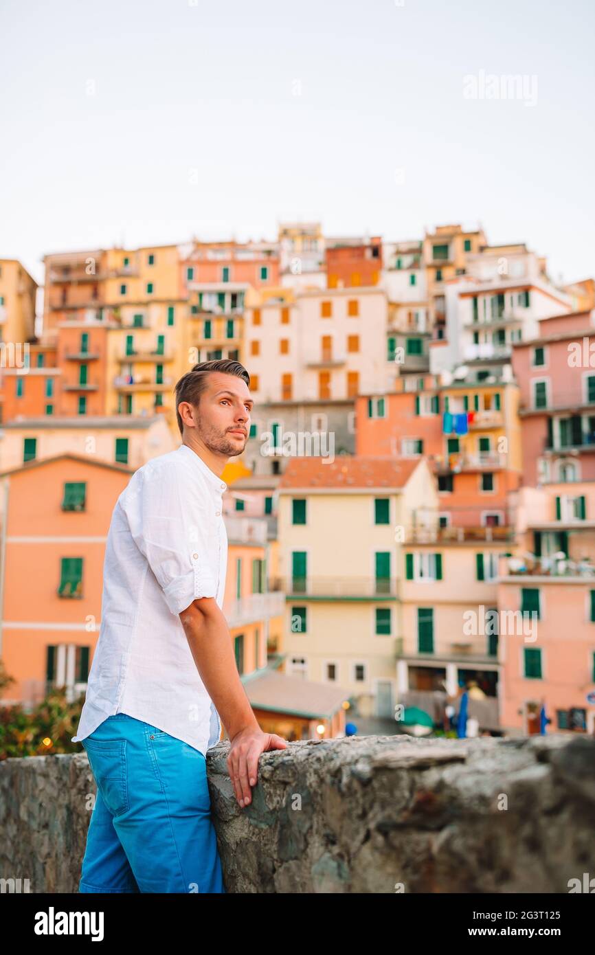 Man tourist outdoors in italian village on vacation Stock Photo - Alamy