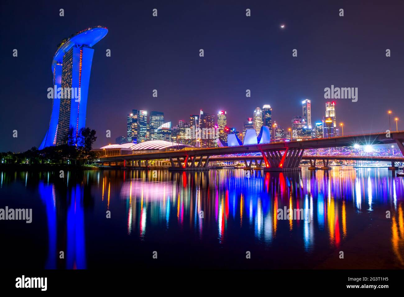 Night and Moon over Singapore Downtown Stock Photo - Alamy