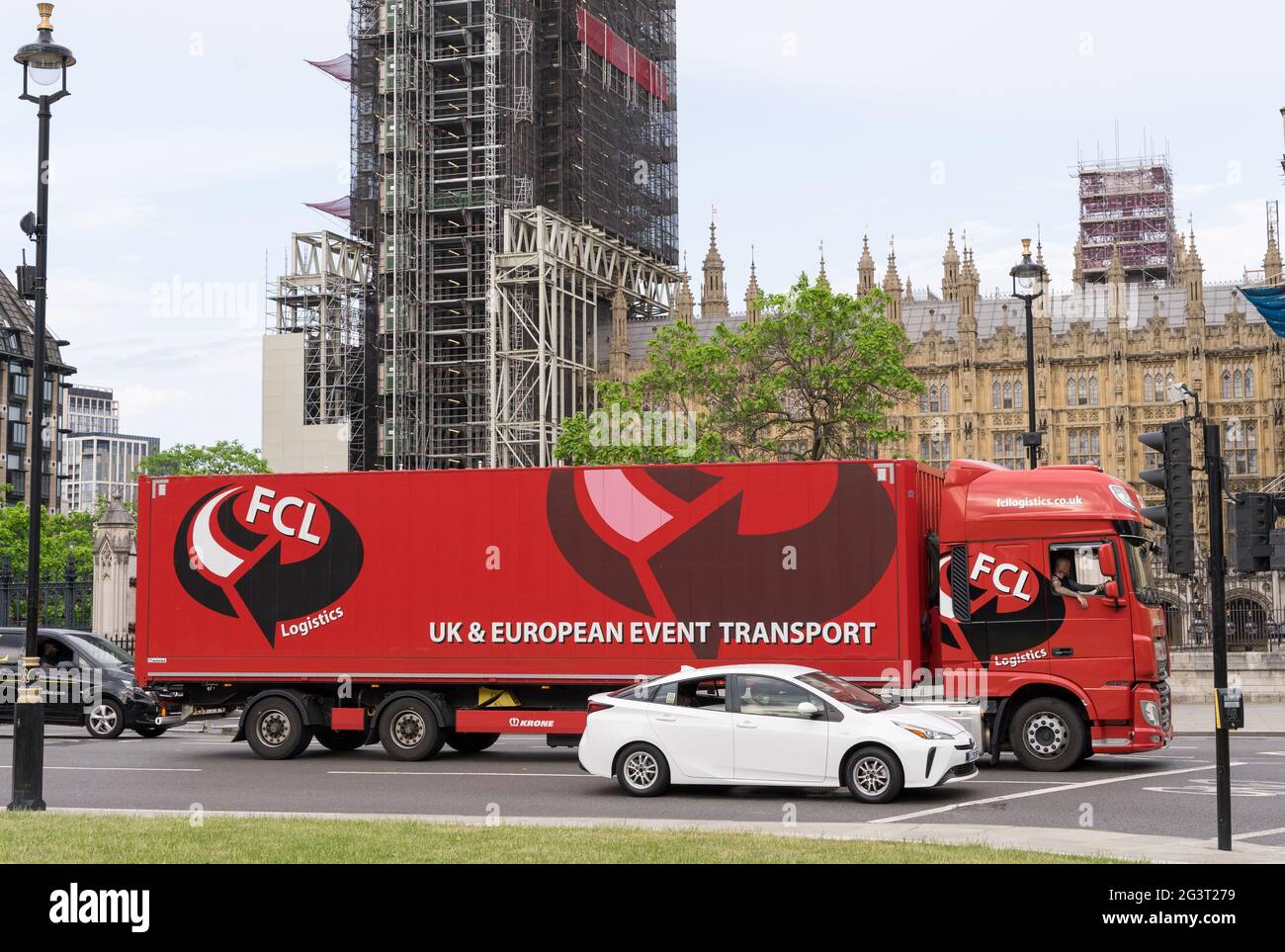 red lorry with logo of UK & EUROPEAN EVENT TRANSFPORT outside House of ...