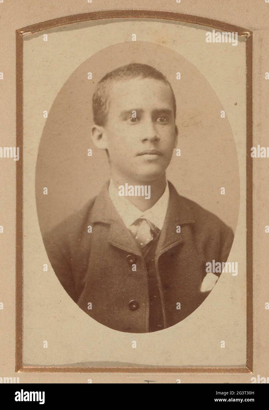 Portrait of (presumably) a Surinamese boy. Part of album with 28 photos ...