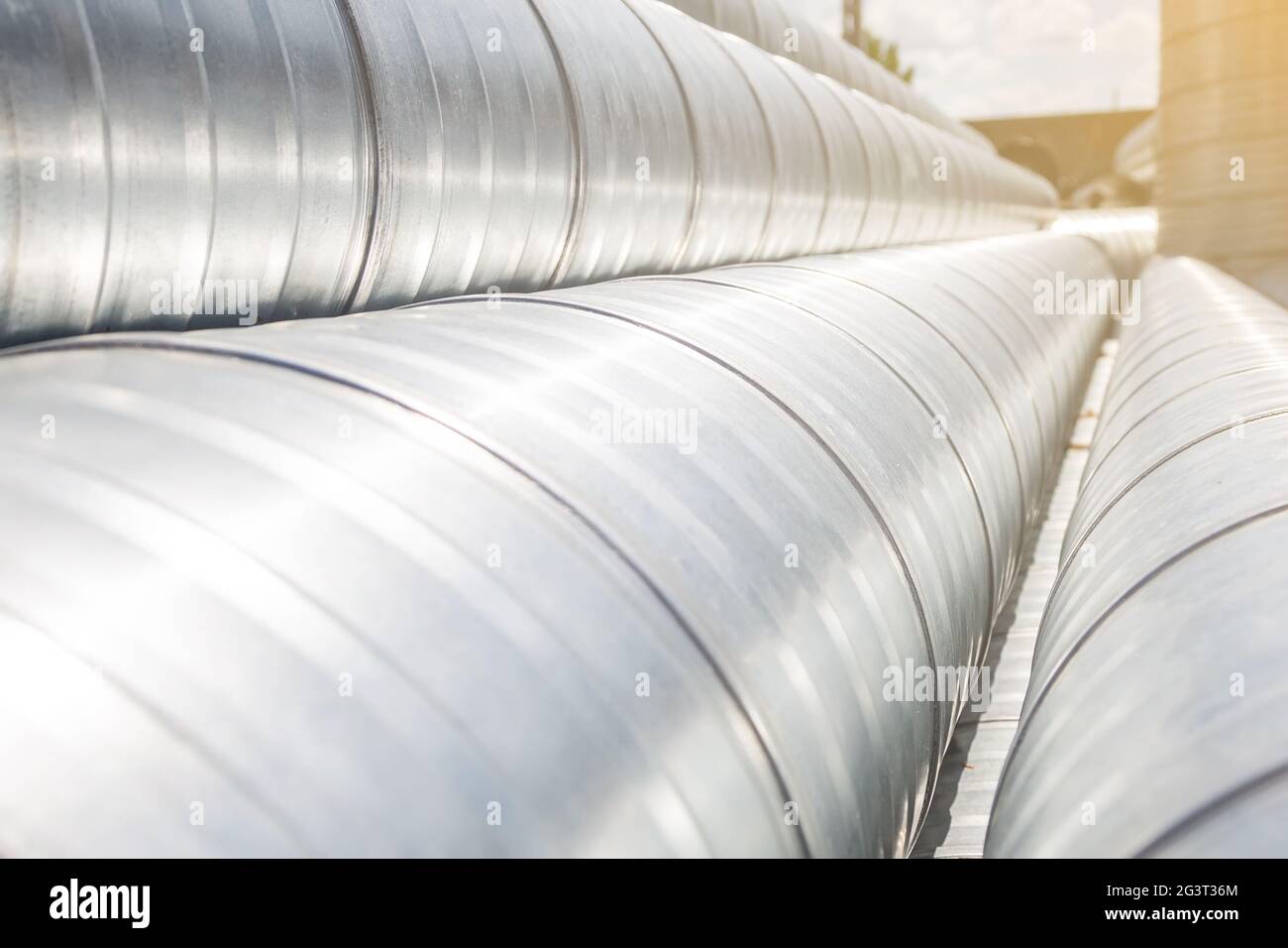 Ventilation pipe warehouse. Steel pipes, parts for the construction of ...
