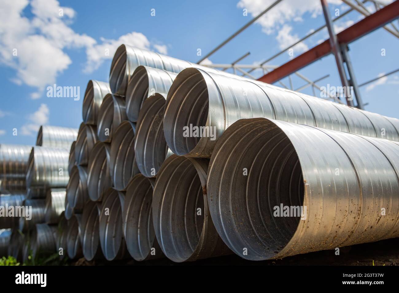 Ventilation pipe warehouse. Steel pipes, parts for the construction of ...