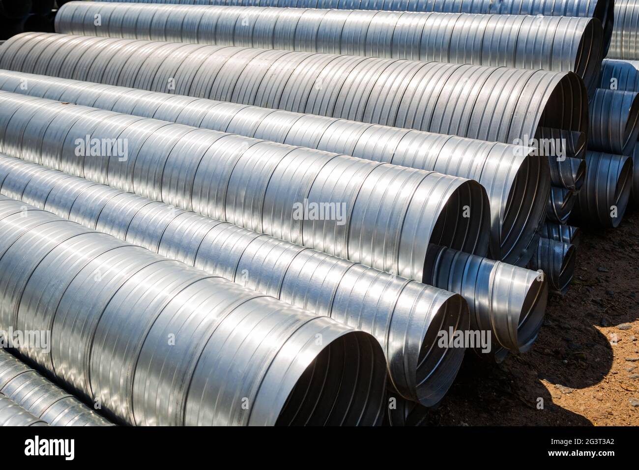 Ventilation pipe warehouse. Steel pipes, parts for the construction of ...