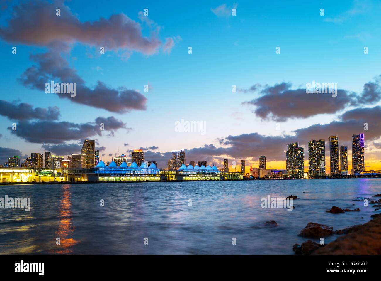 Miami, Florida cityscape skyline on Biscayne Bay. Panorama at dusk with ...