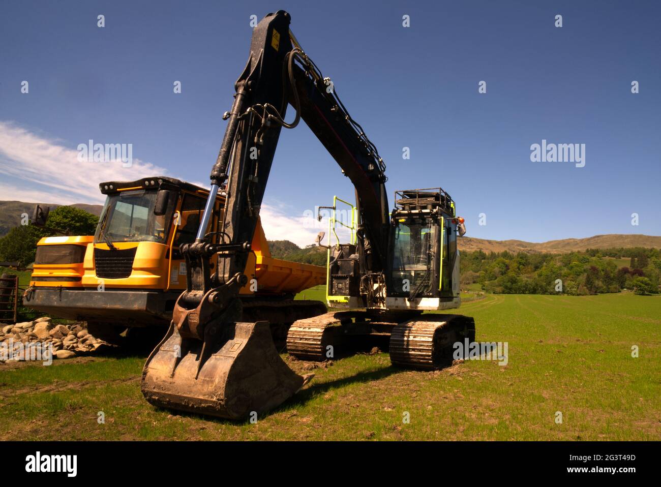 Excavator and bulldozer is on construction site Stock Photo - Alamy