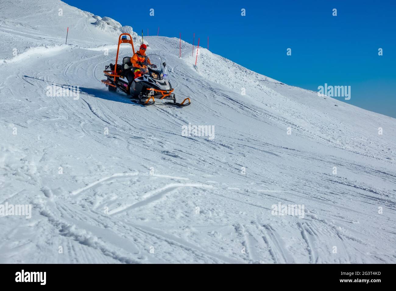 Mountain Rescue Snowmobile on a Ski Slope Stock Photo - Alamy