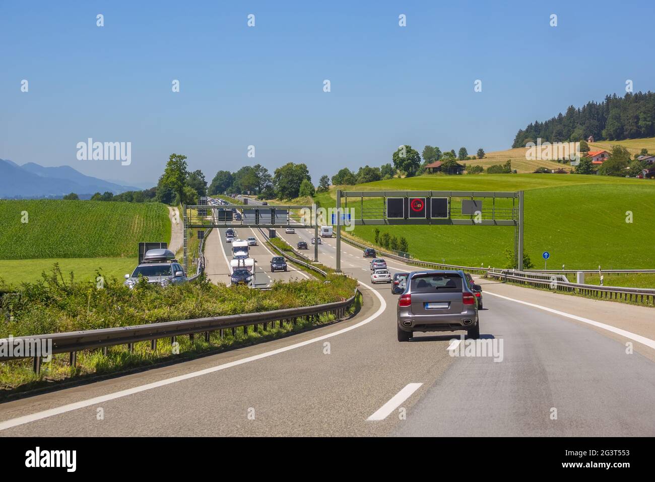 Summer Sunny Day on a Country Highway and Traffic Stock Photo - Alamy