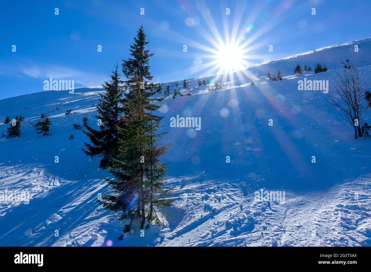 Bright Sun over an Unequipped Ski Slope Stock Photo - Alamy