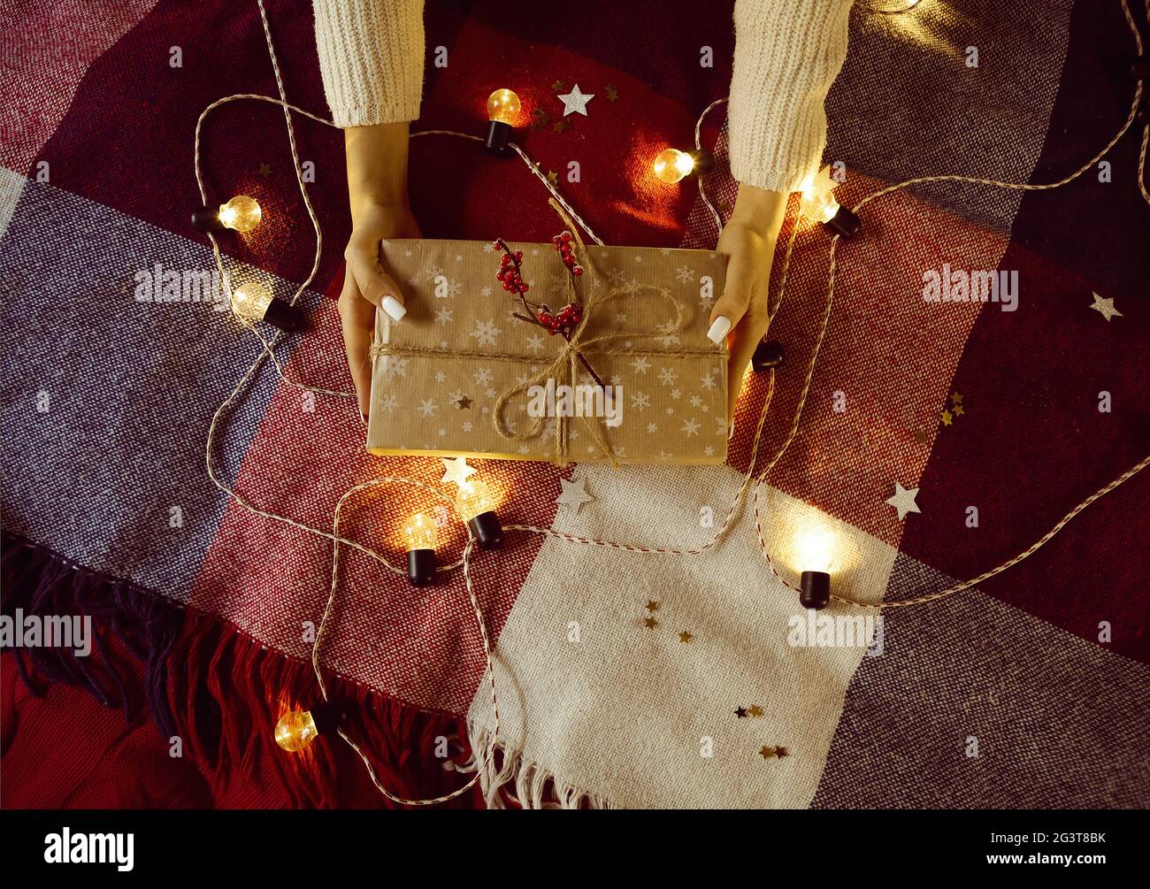 Woman packing surprise gift hi-res stock photography and images - Alamy