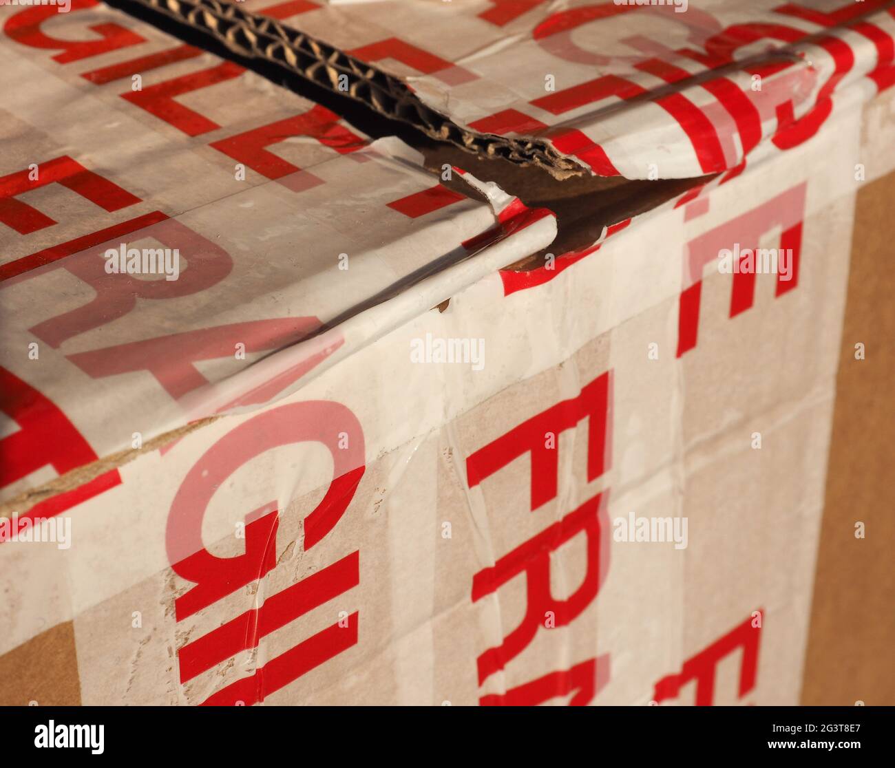 Fragile on cardboard packet Stock Photo - Alamy