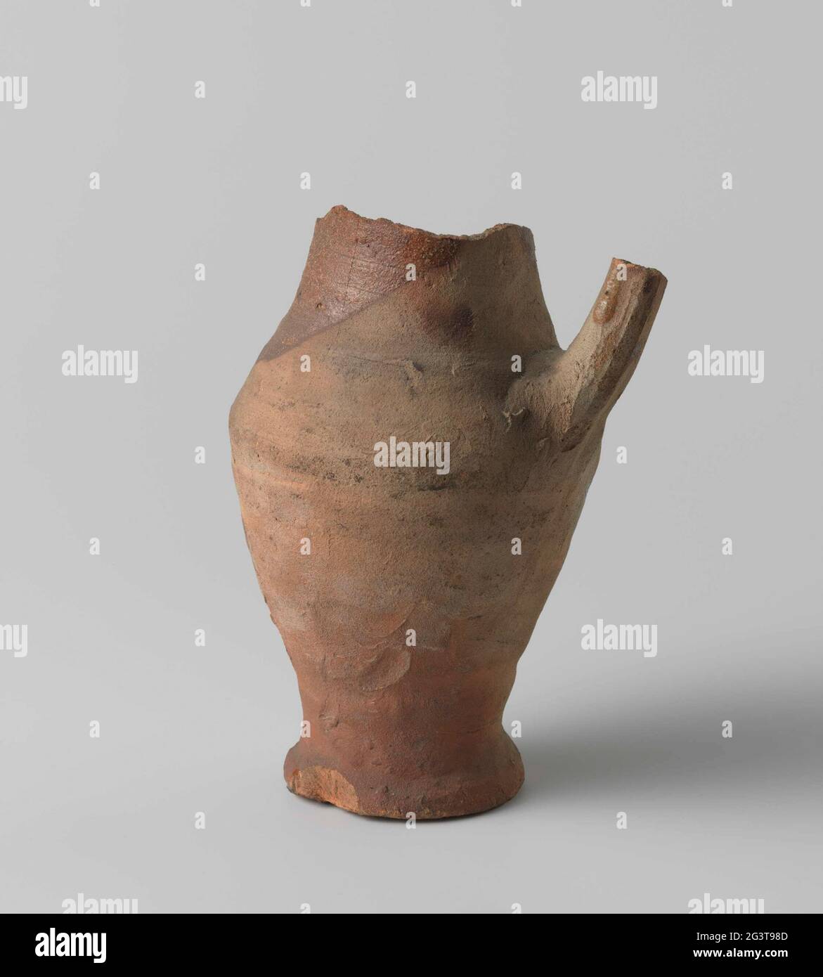 Fragment of jug. Fragment of a jar, remains of glaze on the inside and ...