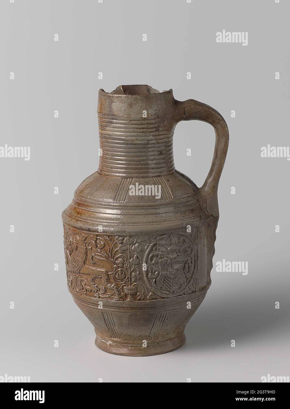 Jug. Uneven, brown colored jug. Belly with a straight-handed center ...