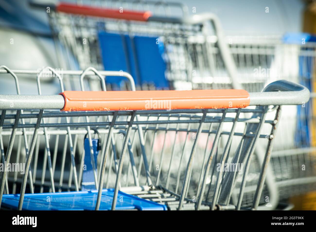 A close-up shot of a shopping cart at the parking lot of a grocery ...