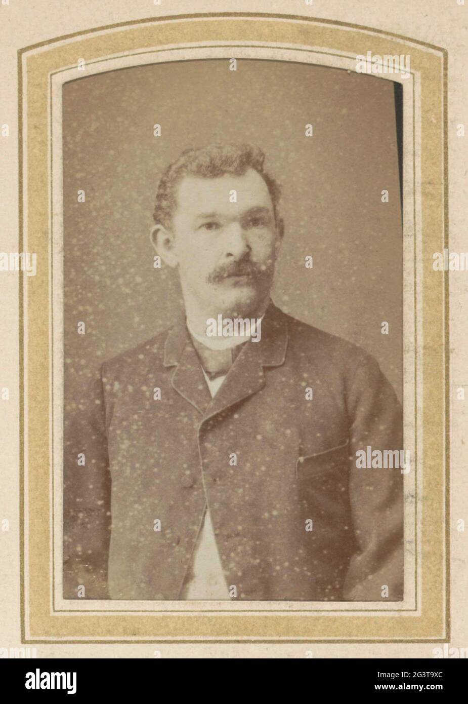 Portrait of a man with a jacket and mustache. Part of photo album from ...