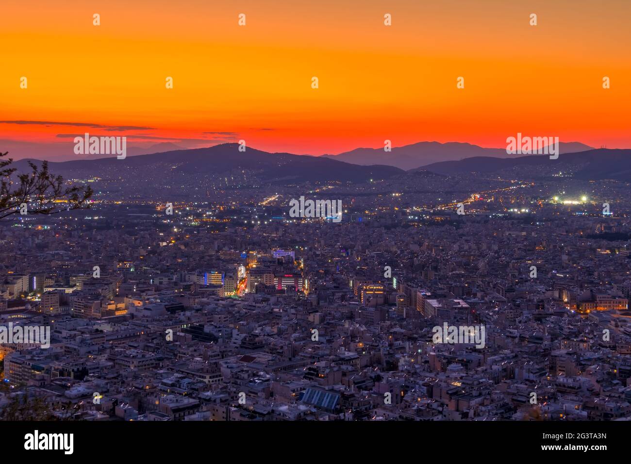 Orange Sunset over Athens Stock Photo - Alamy