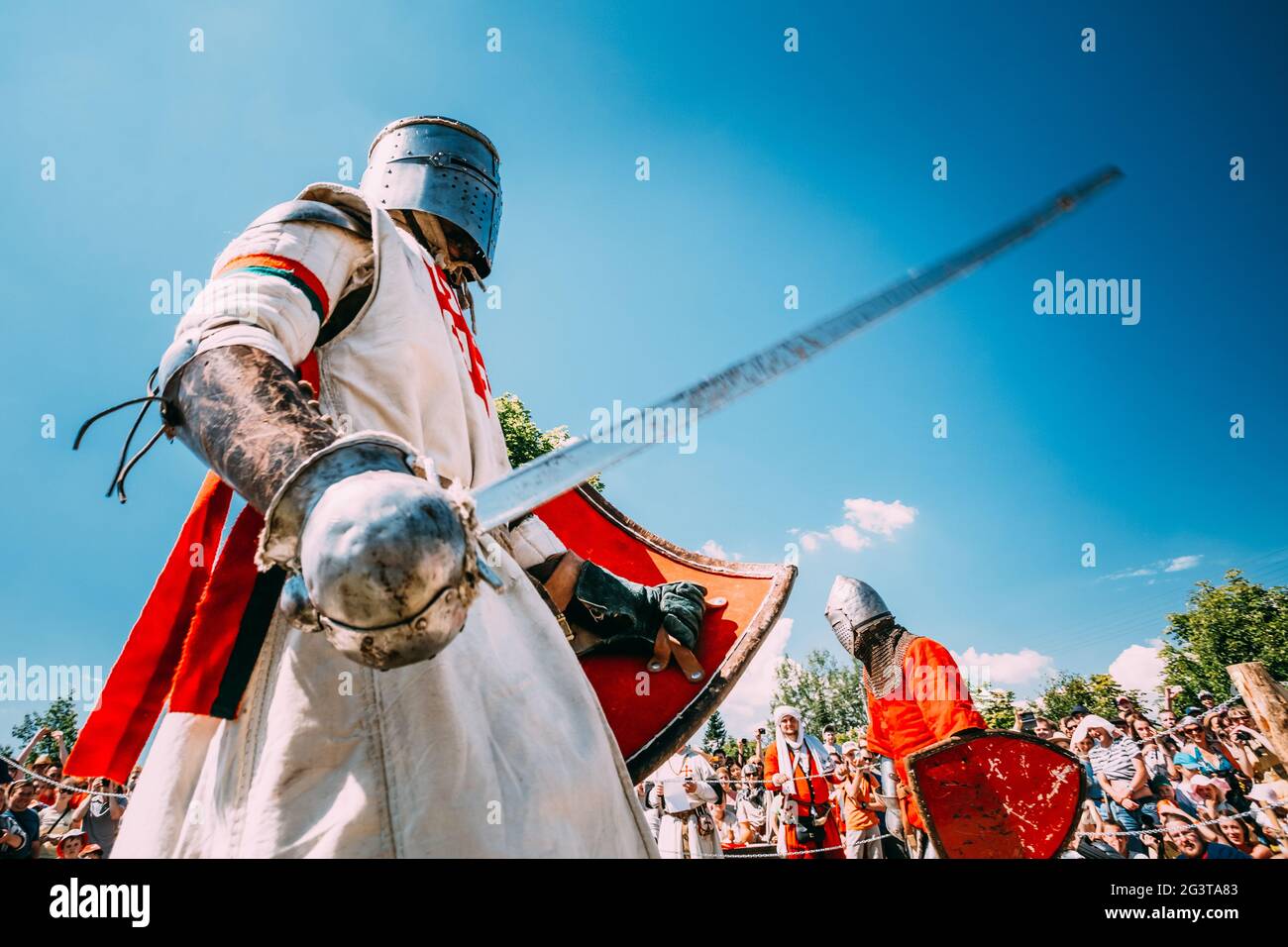 Knights In Fight With Sword. Restoration Of Knightly Battle Stock Photo ...