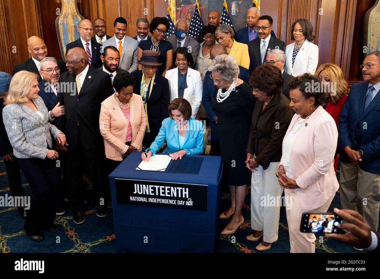 Nancy pelosi signing bill 2021 hi-res stock photography and images - Alamy