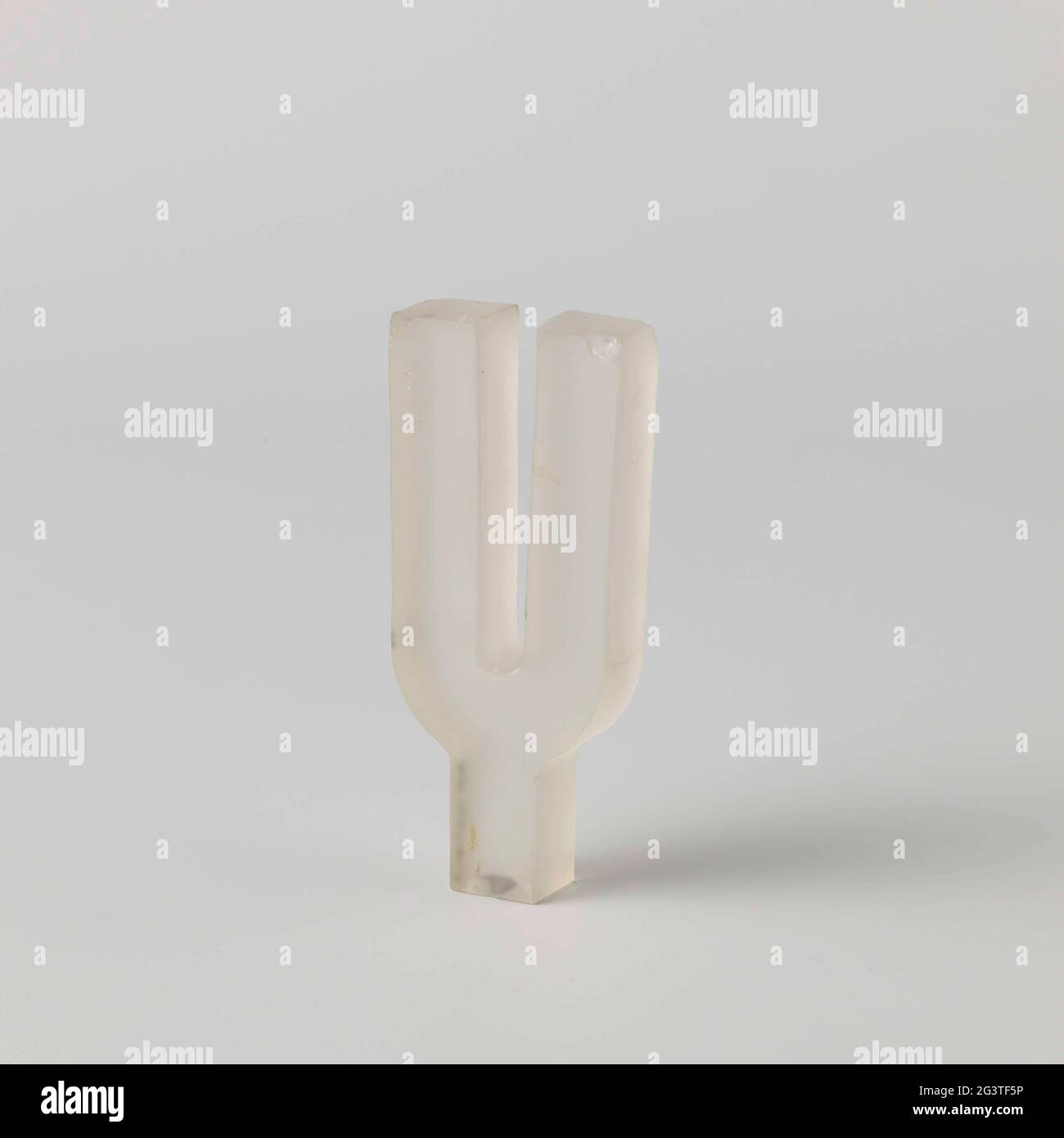 Glass tuning fork. Voting fork made from DOF glass Stock Photo - Alamy