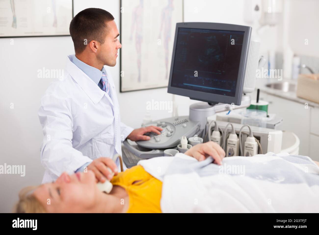 Adult woman undergoing examination thyroid Stock Photo - Alamy